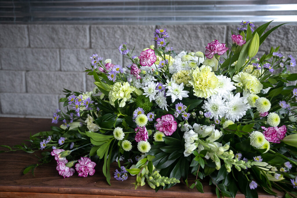 Dreamer Casket Spray | In Bloom Flowers